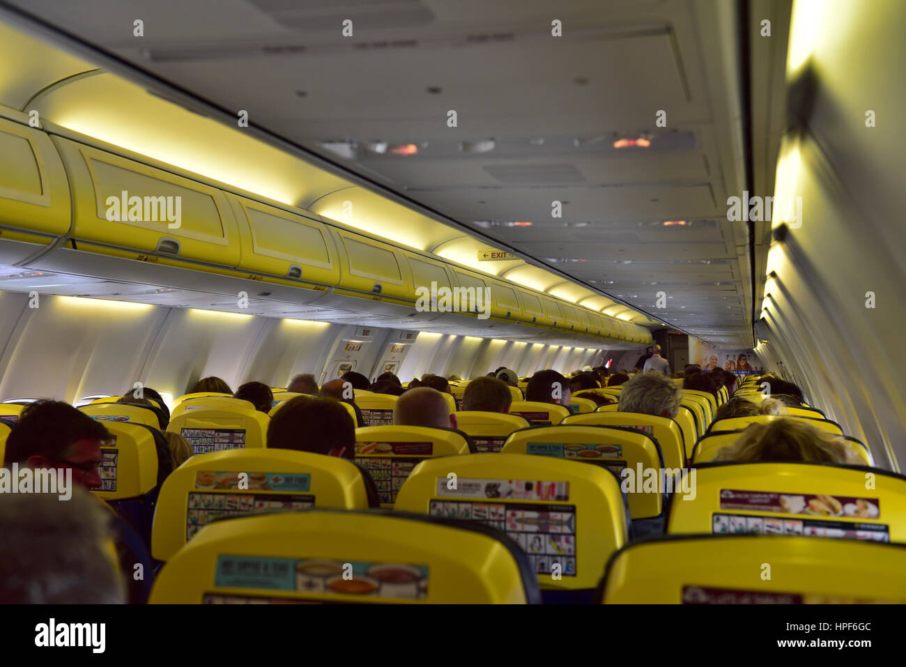 Passengers inside Ryanair airplane Stock Photo - Alamy