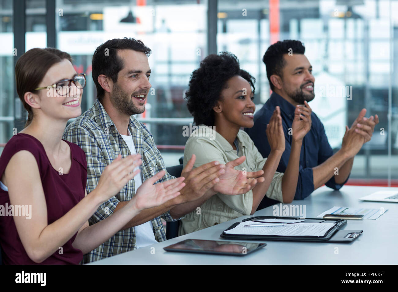 Happy business team clapping hand hi-res stock photography and images ...