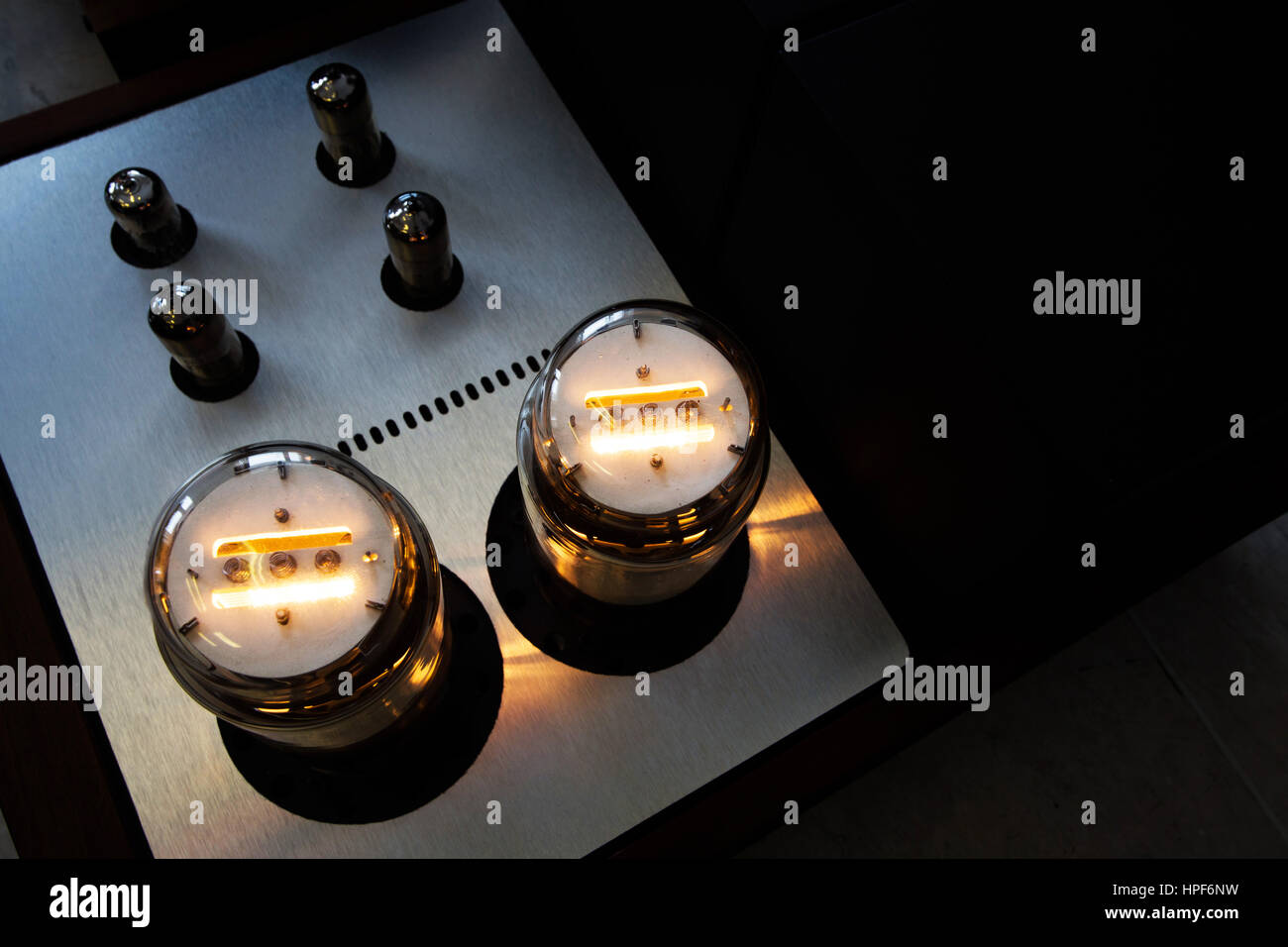 Vintage retro music amplifier with glass lamps light on Stock Photo - Alamy