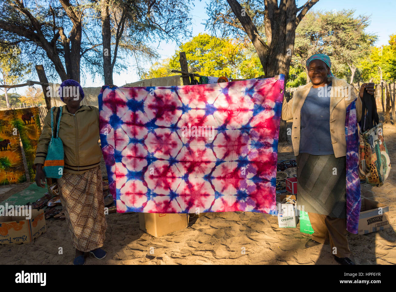 Community craftsmen show off their curios in Zimbabwe near the border ...