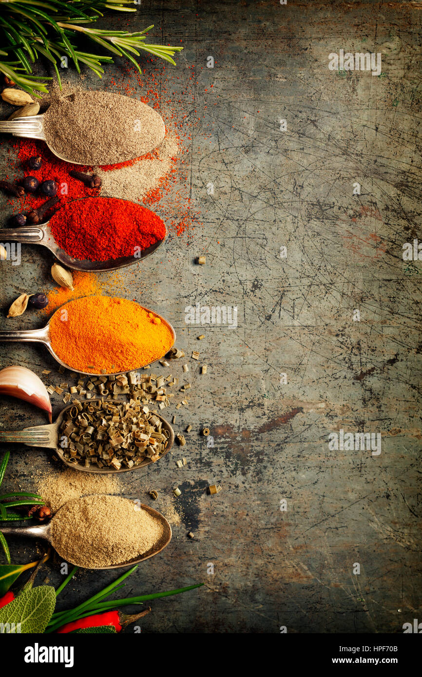 Herbs and spices selection on rustic background - cooking, gardening or ...