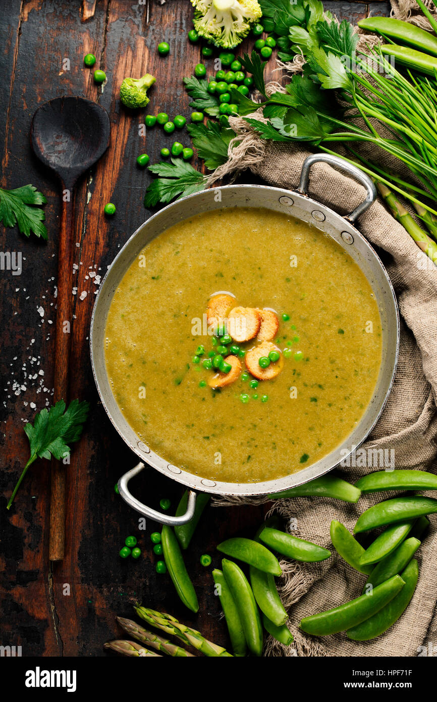 Vegetable cream soup on dark rustic background Stock Photo - Alamy