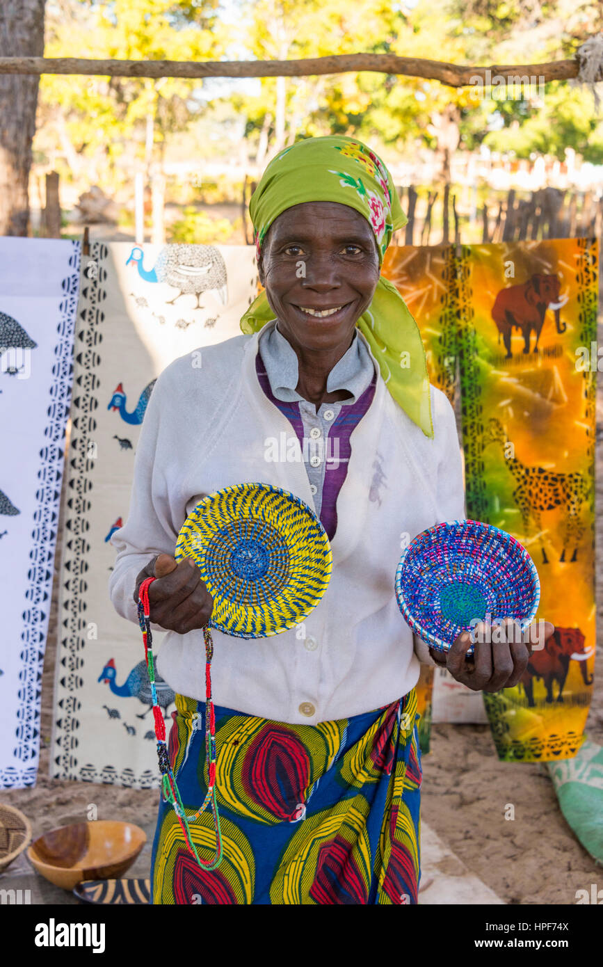 Community craftsmen show off their curios in Zimbabwe near the border ...