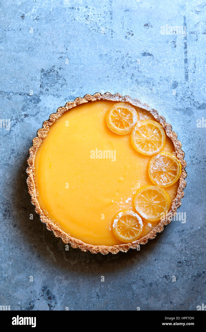 Classic lemon tart garnished with candied lemon slices.Top view Stock ...