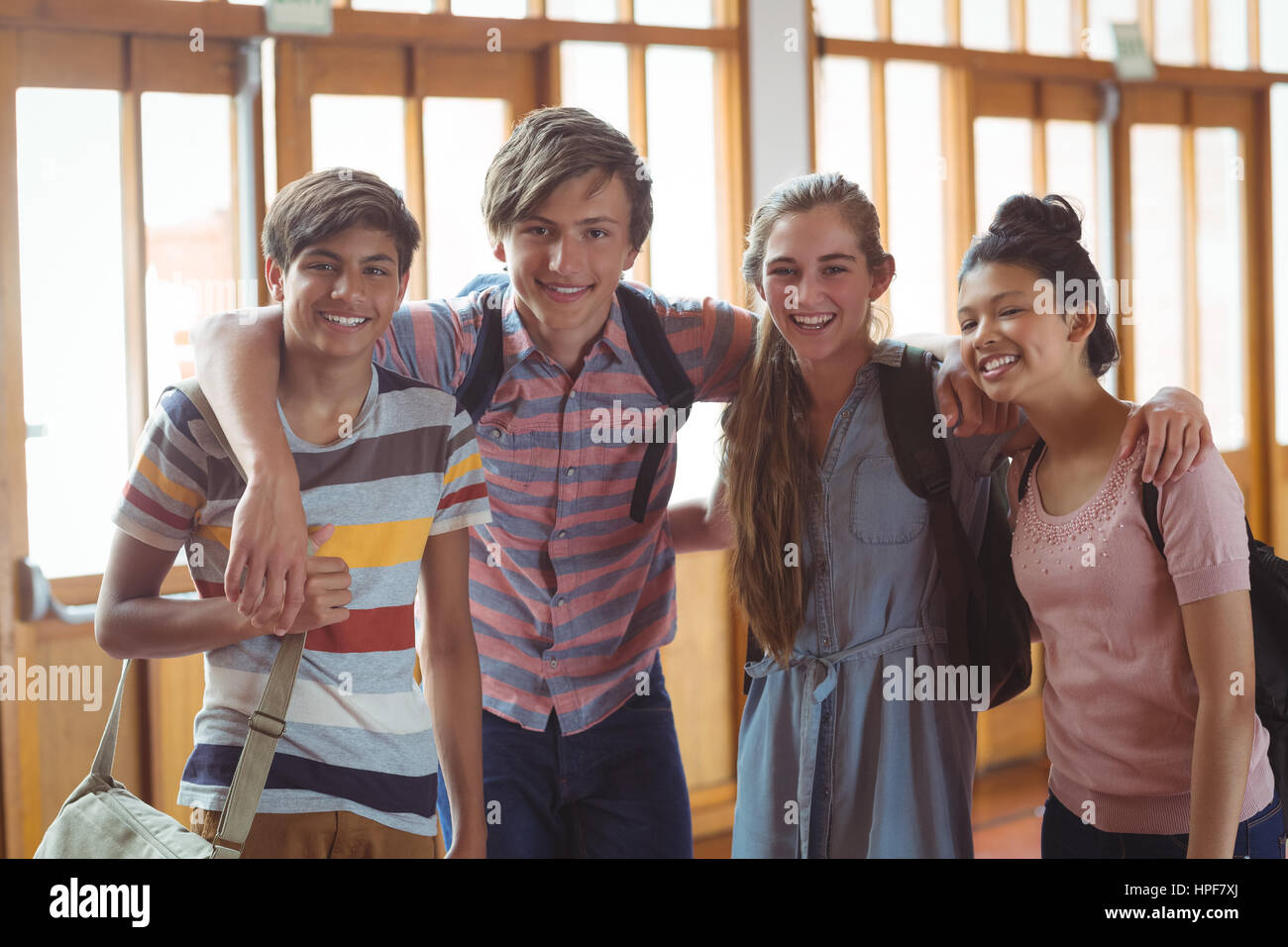 Arm in arm students teenager hi-res stock photography and images - Alamy