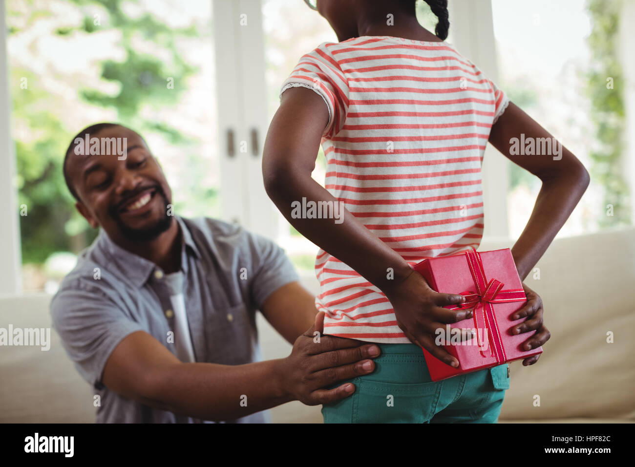 Girl Child Hiding Behind Man High Resolution Stock Photography and ...