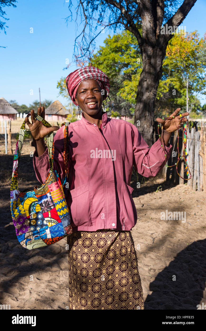 Community craftsmen show off their curios in Zimbabwe near the border ...