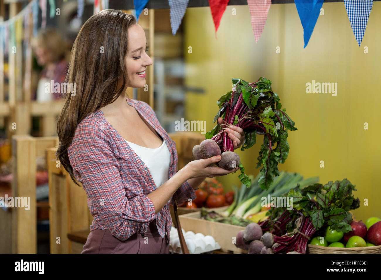 Woman buying vegetables in marketplace hi-res stock photography and ...