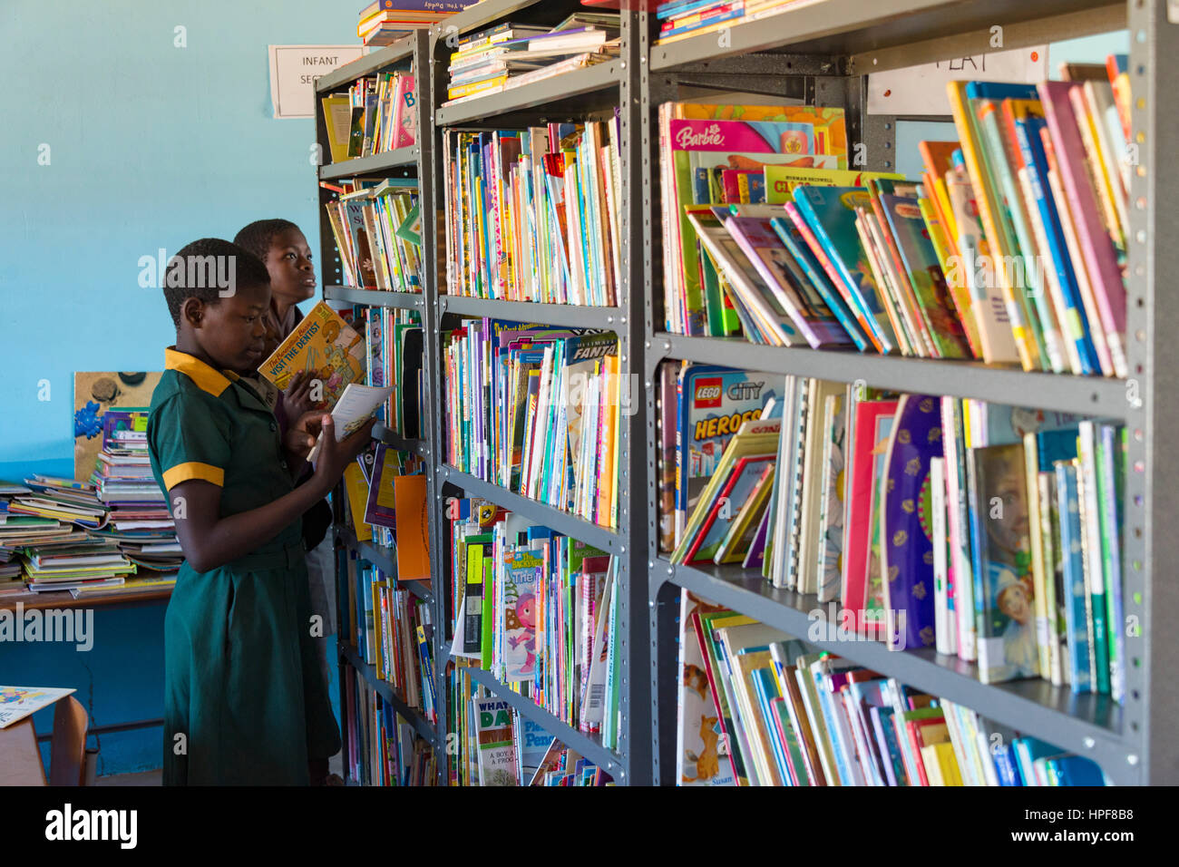 African children read books in a library in Zimbabwe Stock Photo - Alamy