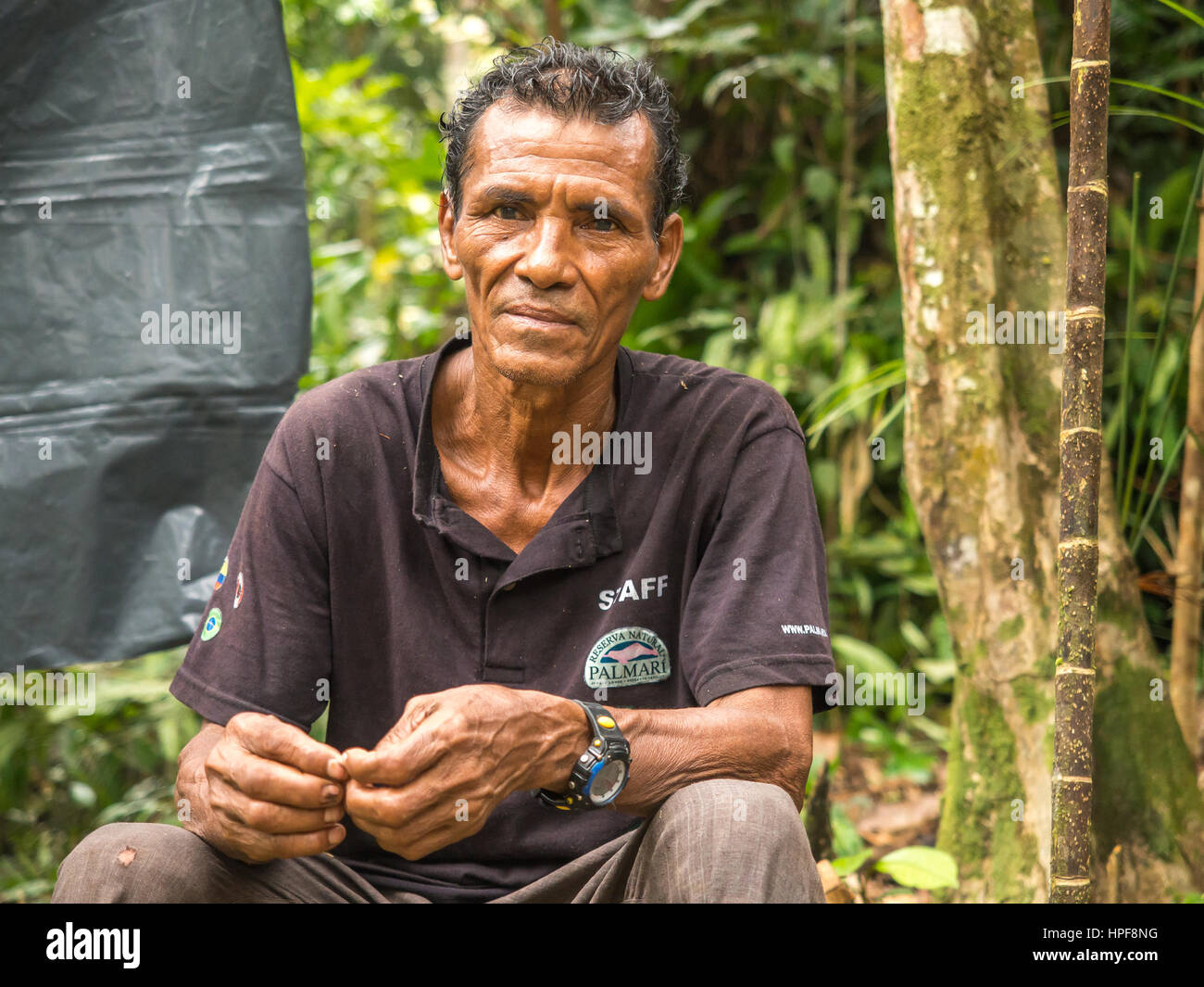 Jungle, Brazil - May 8, 2016: Portrait of a man with a red skin in the ...