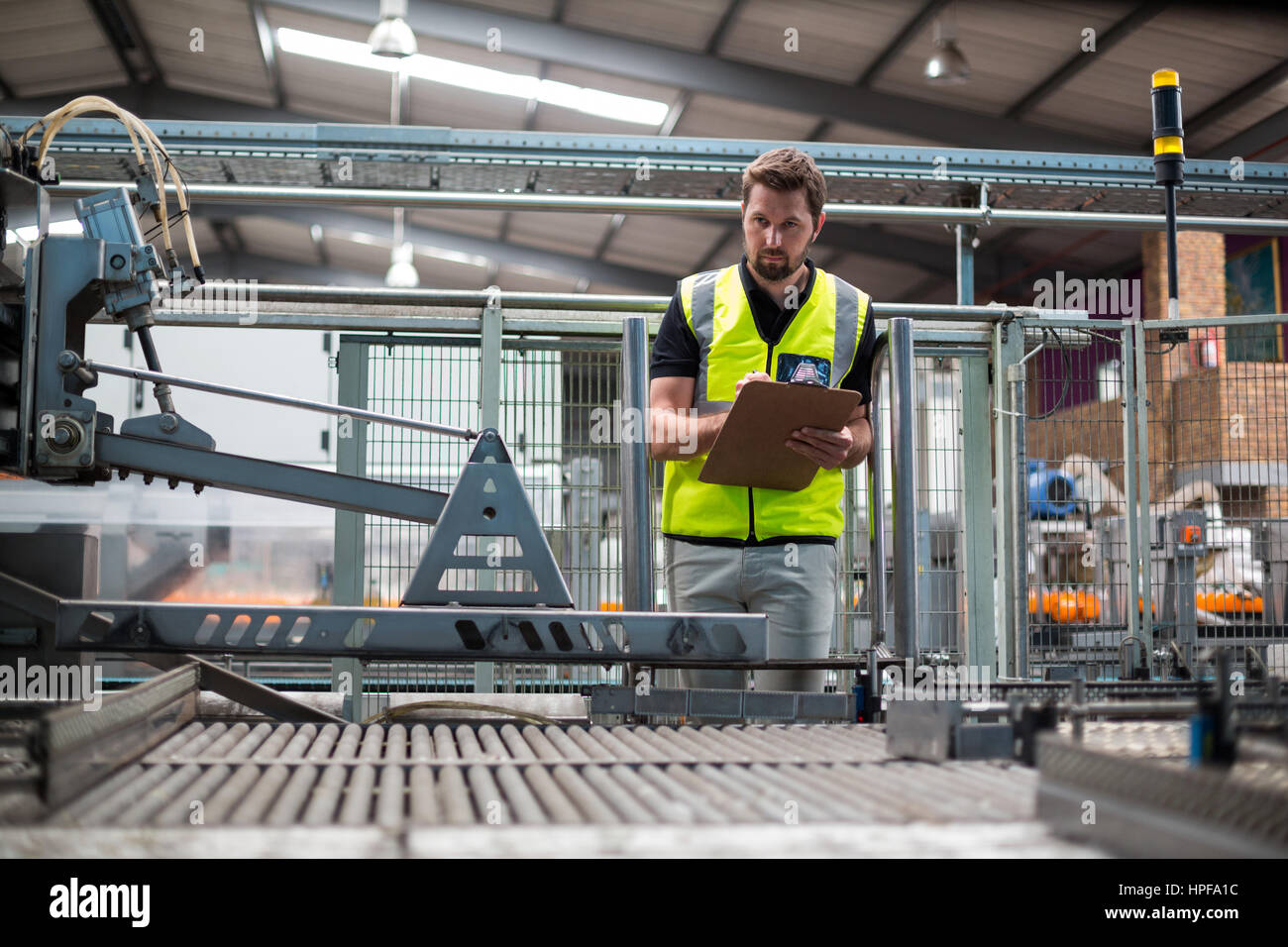 Factory worker maintaining record hi-res stock photography and images ...