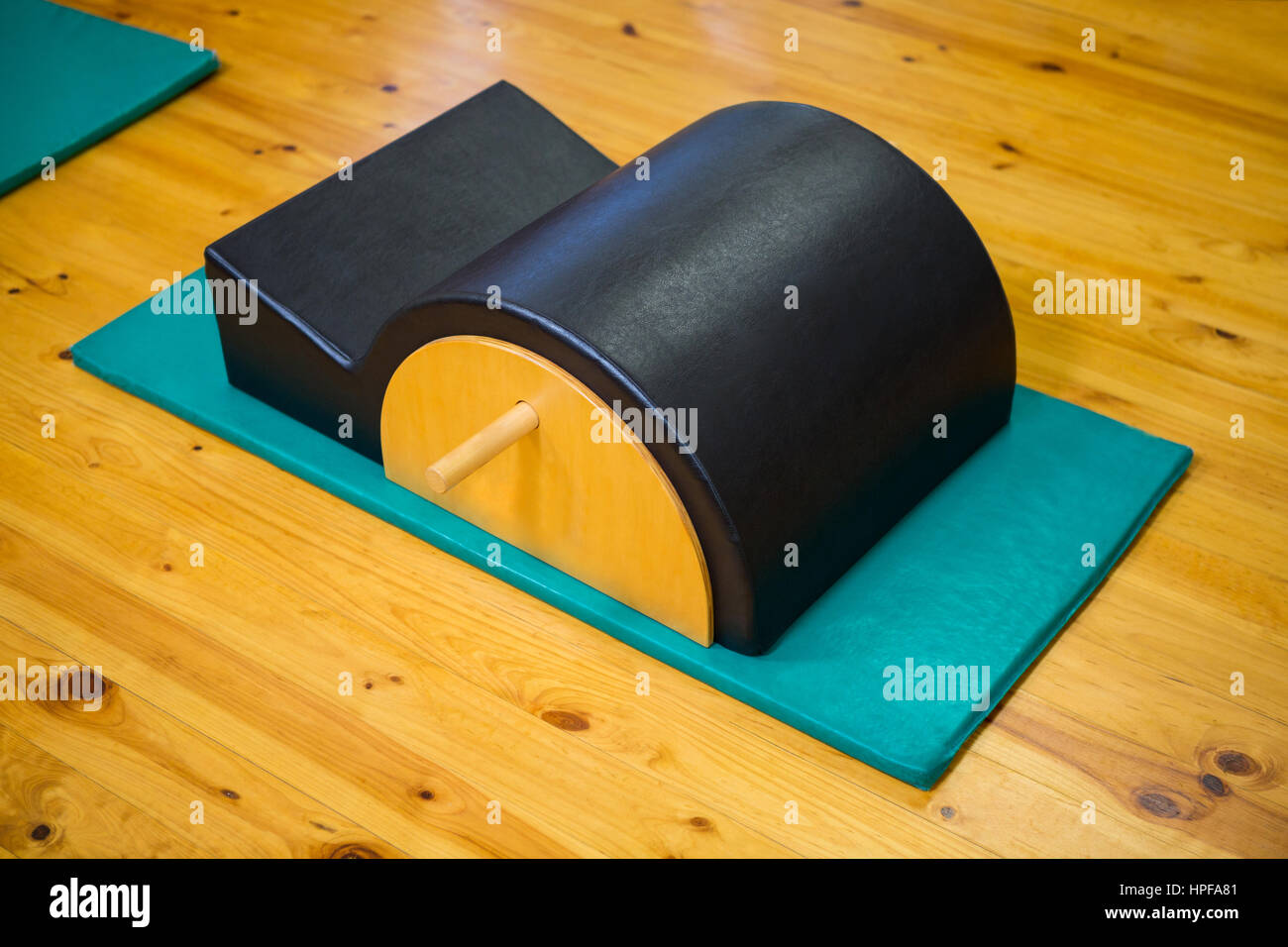 Arc barrel on wooden floor in gym Stock Photo - Alamy