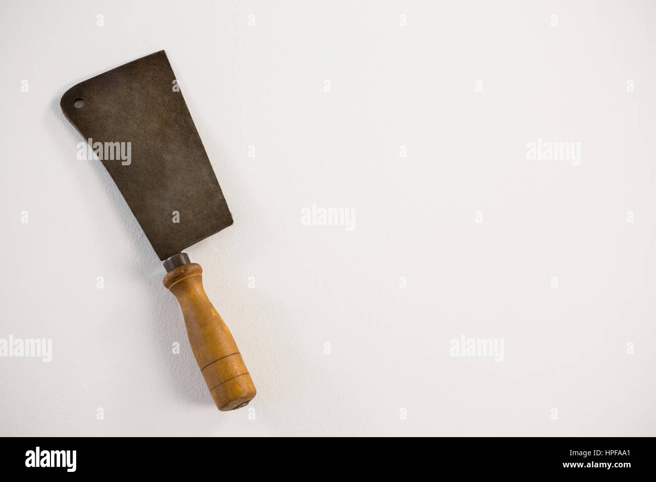 Meat cutting cleaver against white background Stock Photo - Alamy