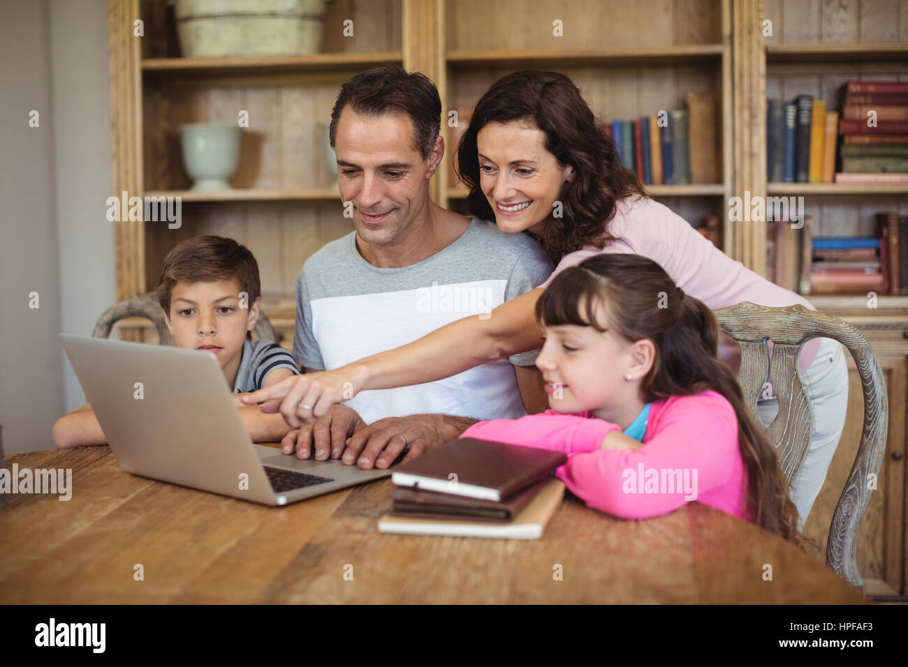 Kids parents table hi-res stock photography and images - Alamy