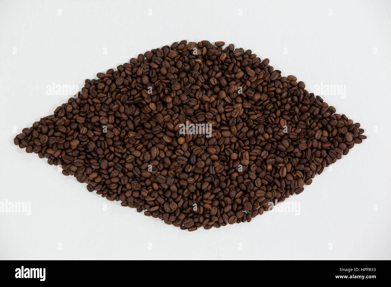 Coffee forming lips on white background Stock Photo - Alamy