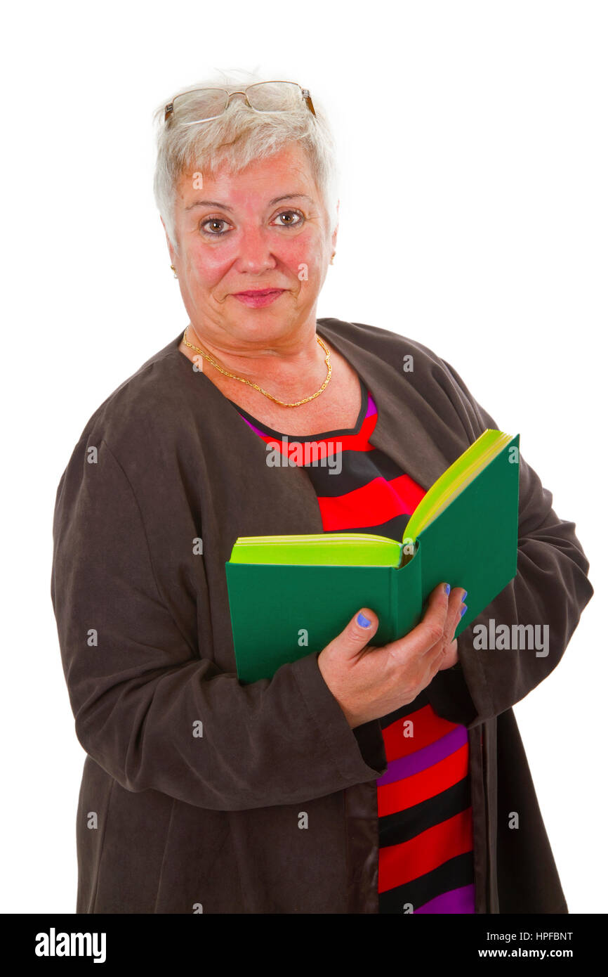 Female senior reading a book - isolated on white background Stock Photo ...