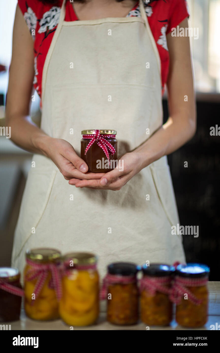 Woman holding jar jam hi-res stock photography and images - Alamy