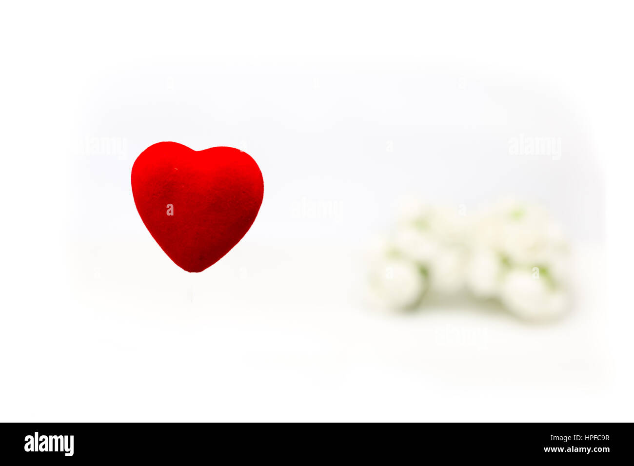 Red heart on pure white background Stock Photo - Alamy