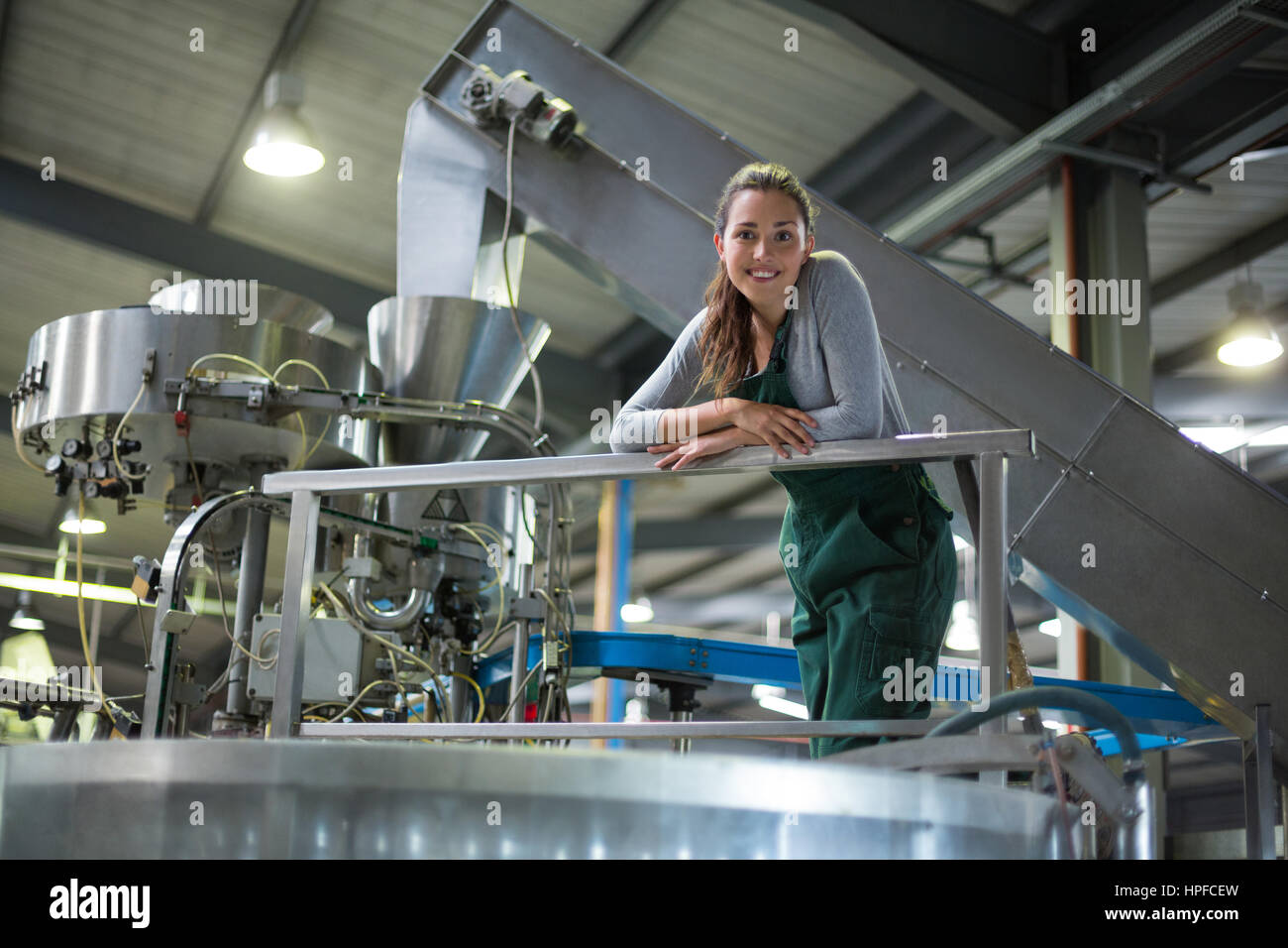 Professional woman standing near railing hi-res stock photography and ...