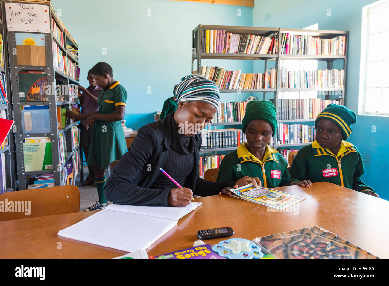 African children read books in a library in Zimbabwe Stock Photo - Alamy