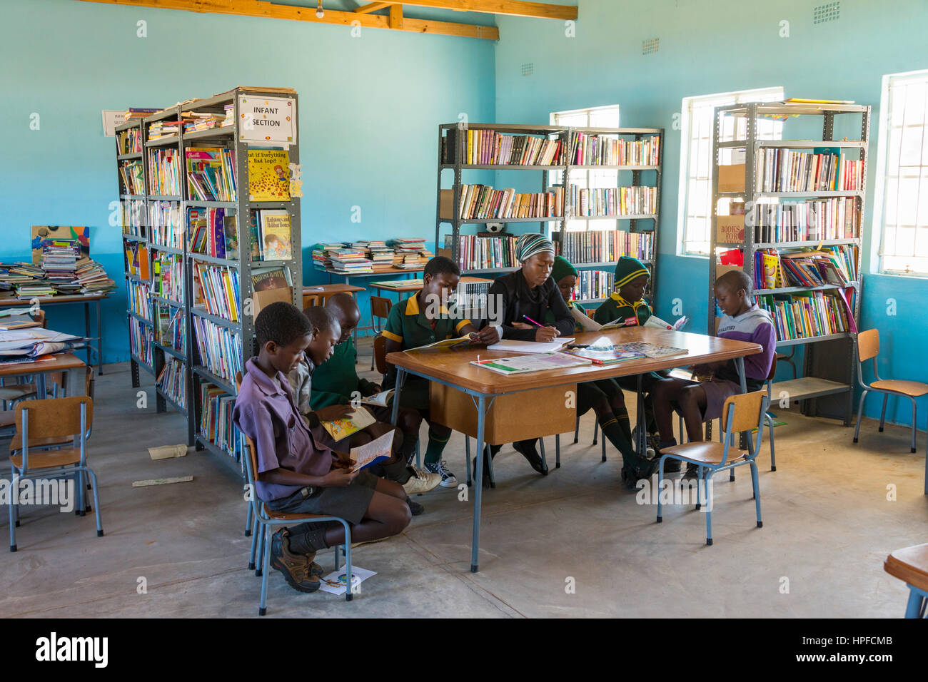 African children read books in a library in Zimbabwe Stock Photo - Alamy