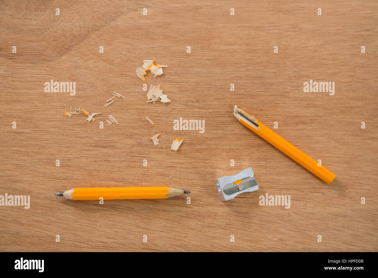 Broken yellow pencil with sharpener on wooden background Stock Photo ...