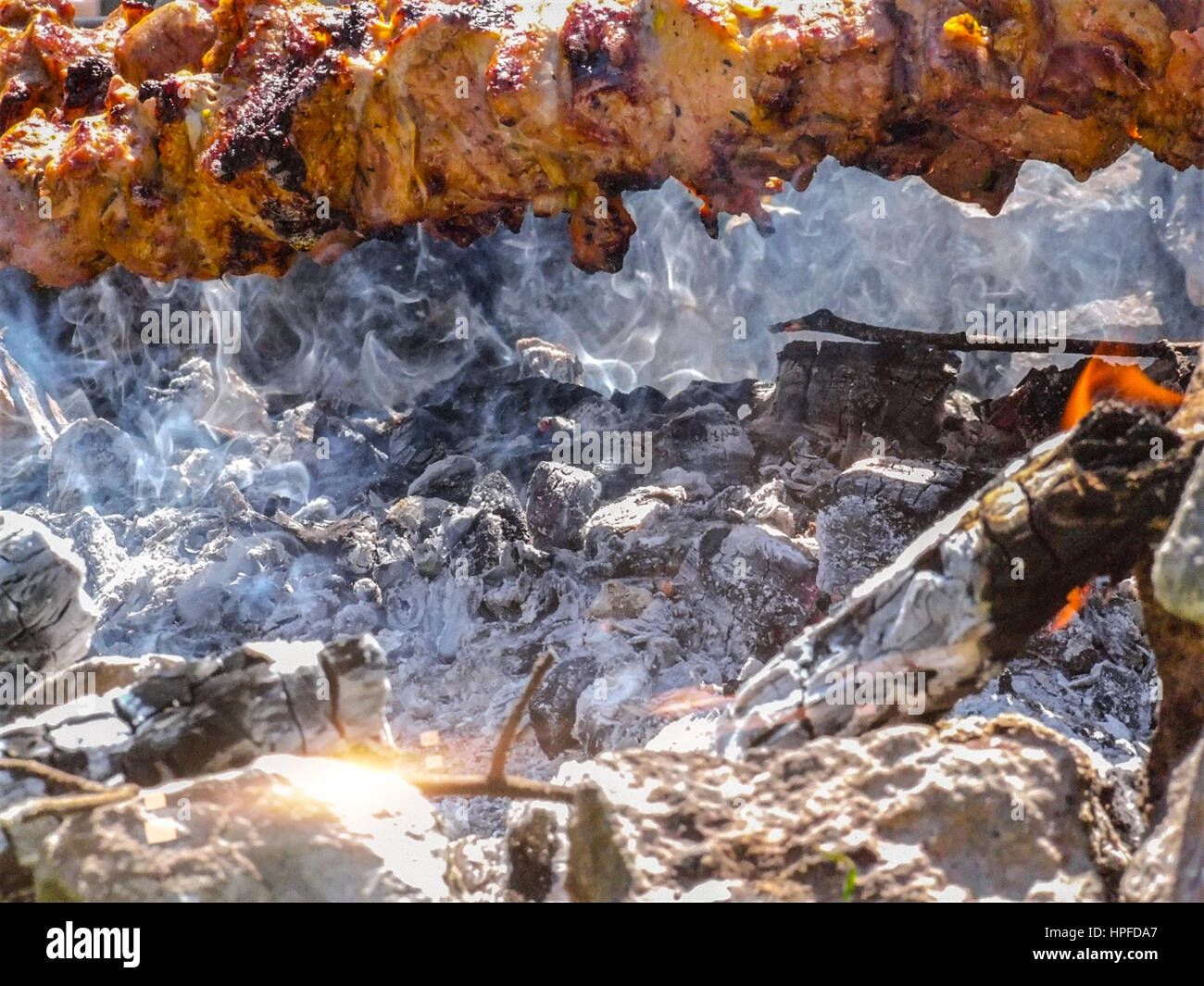 The cooking meat on the fire. Shish kebab Stock Photo - Alamy