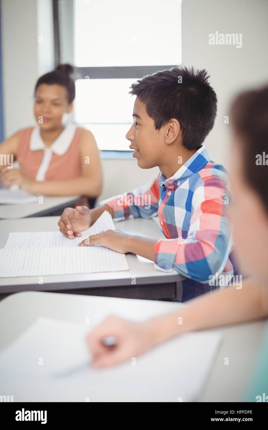 Students studying in classroom at school Stock Photo - Alamy