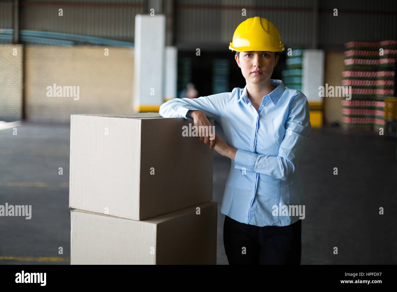 Beautiful female worker in hard hi-res stock photography and images - Alamy