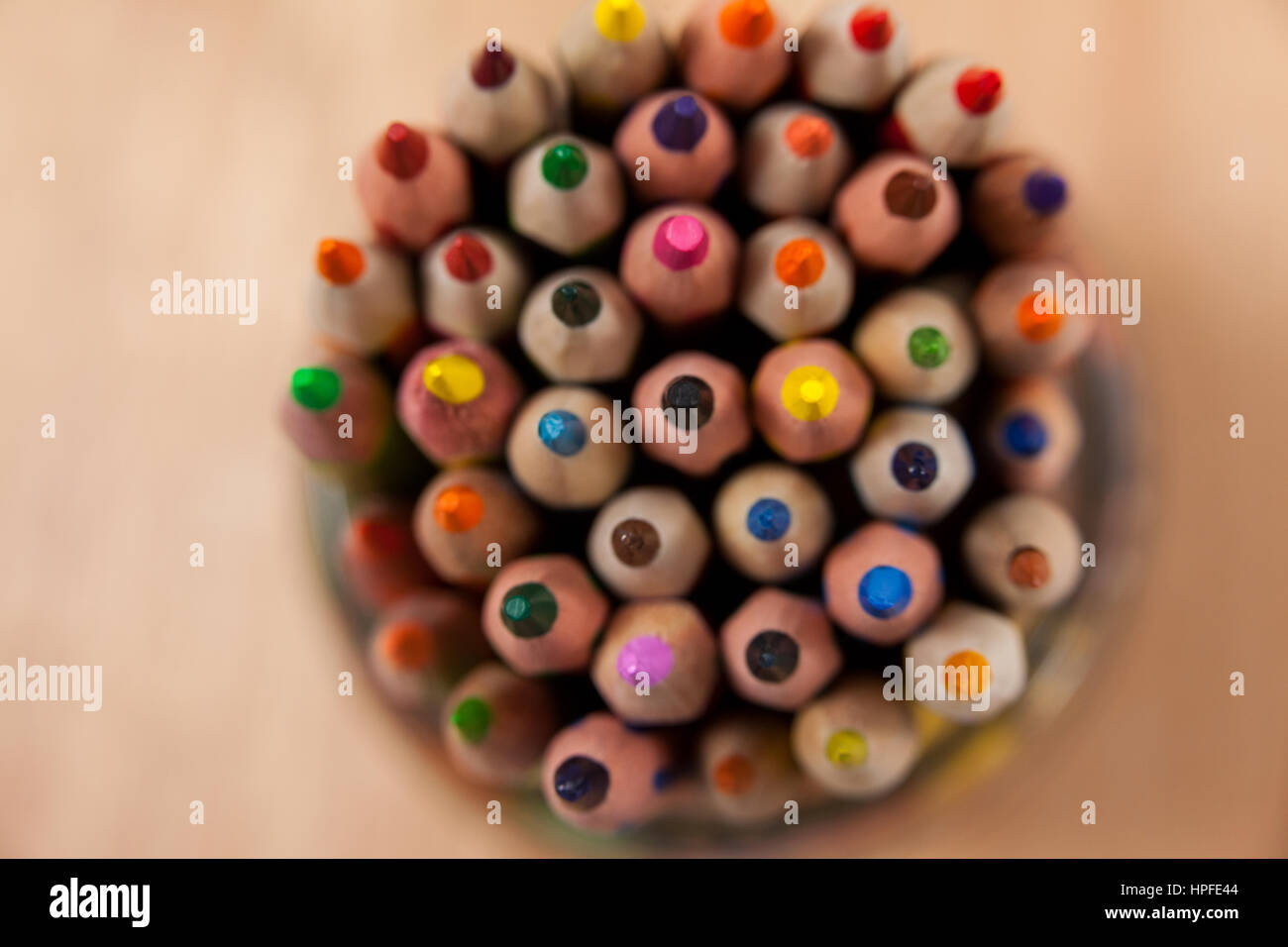 Bunch of colored pencil on wooden background Stock Photo - Alamy