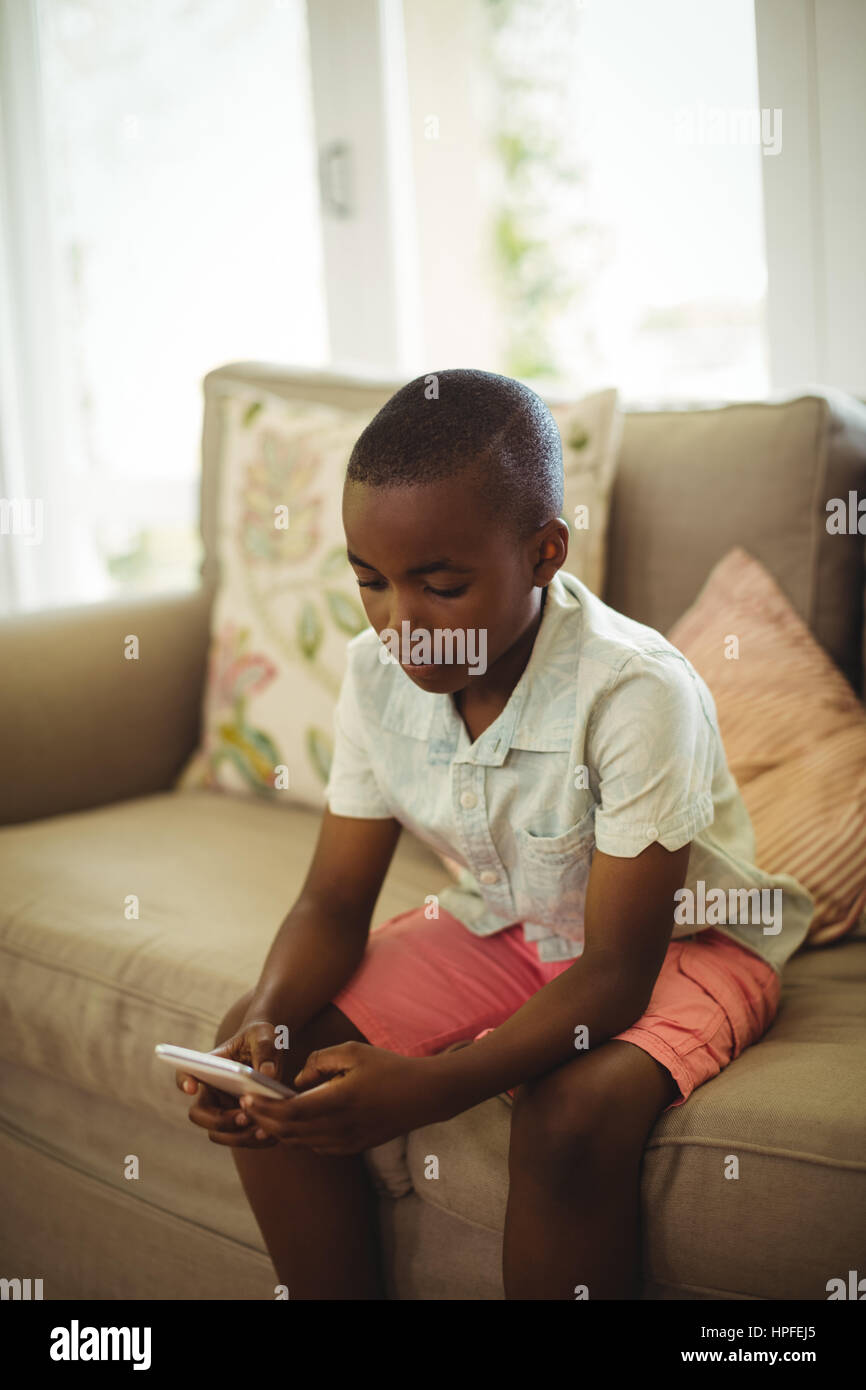 Boy using mobile phone upset hi-res stock photography and images - Alamy