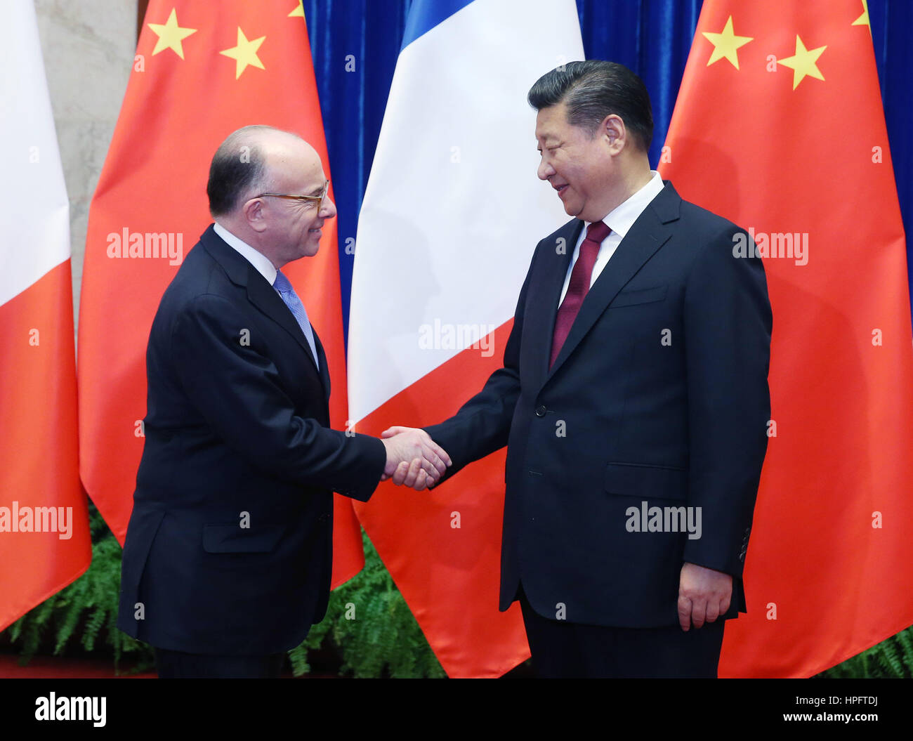 Beijing, China. 22nd Feb, 2017. Chinese President Xi Jinping (R) meets ...
