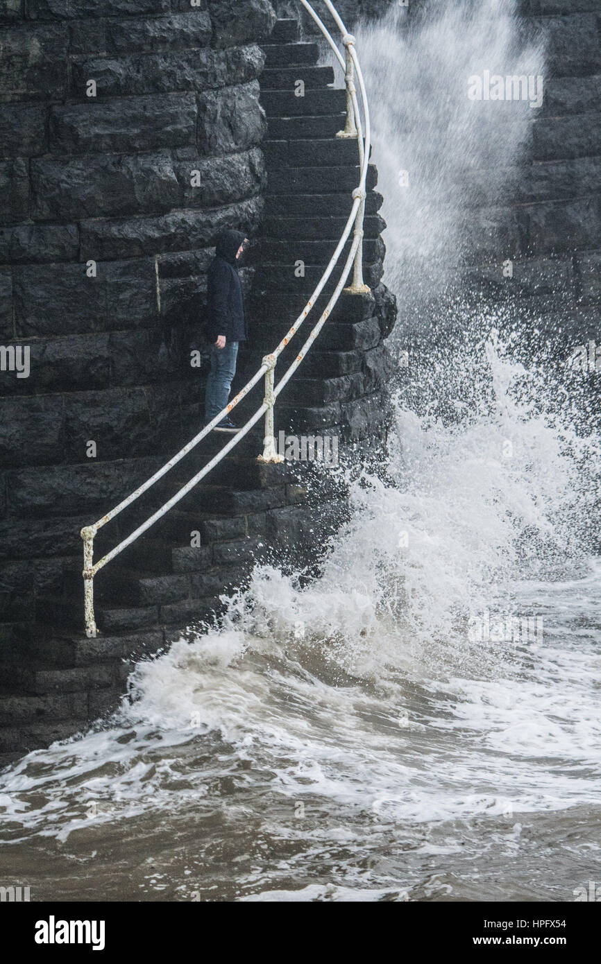 Boy standing sea watching waves hi-res stock photography and images - Alamy