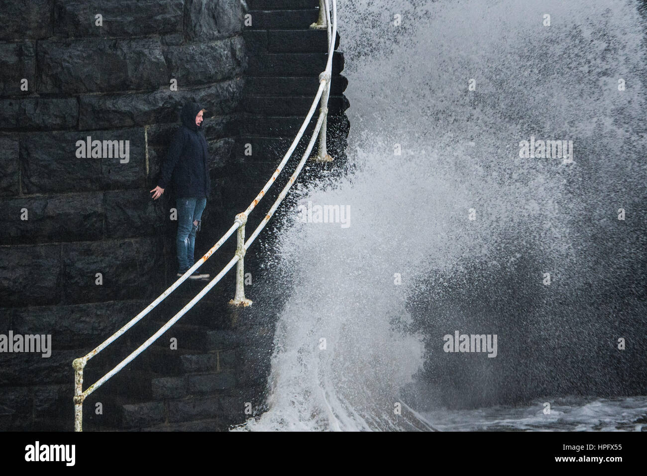 Boy standing sea watching waves hi-res stock photography and images - Alamy