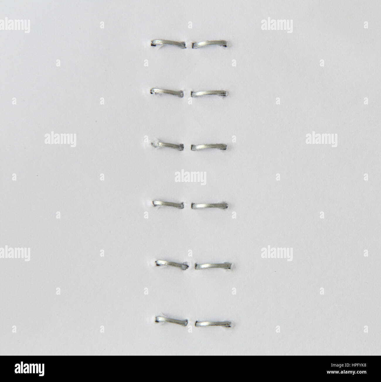 Stapled paper hi-res stock photography and images - Alamy