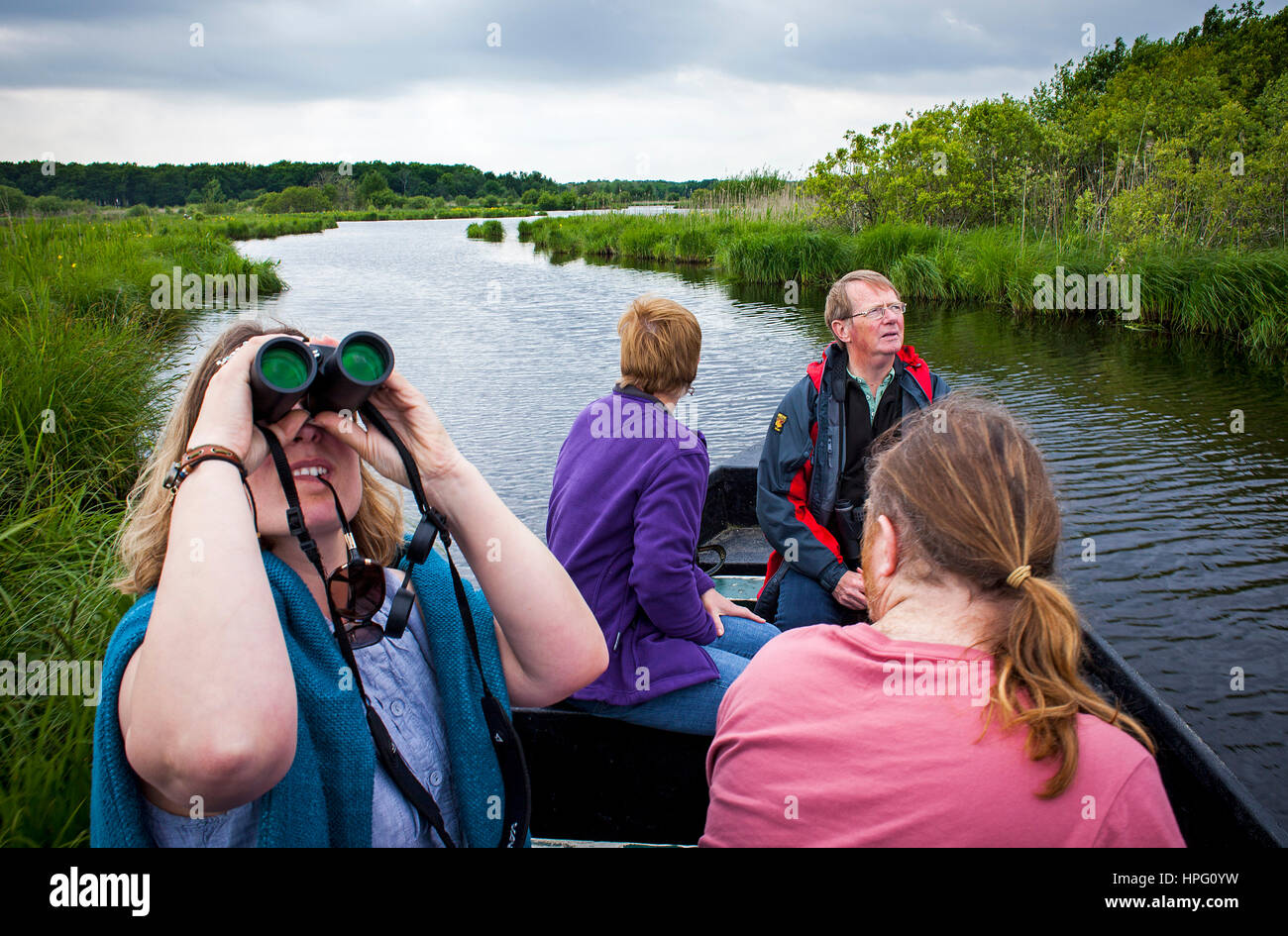 Barge with tourists,looking for birds, near Port of Breca, Natural ...