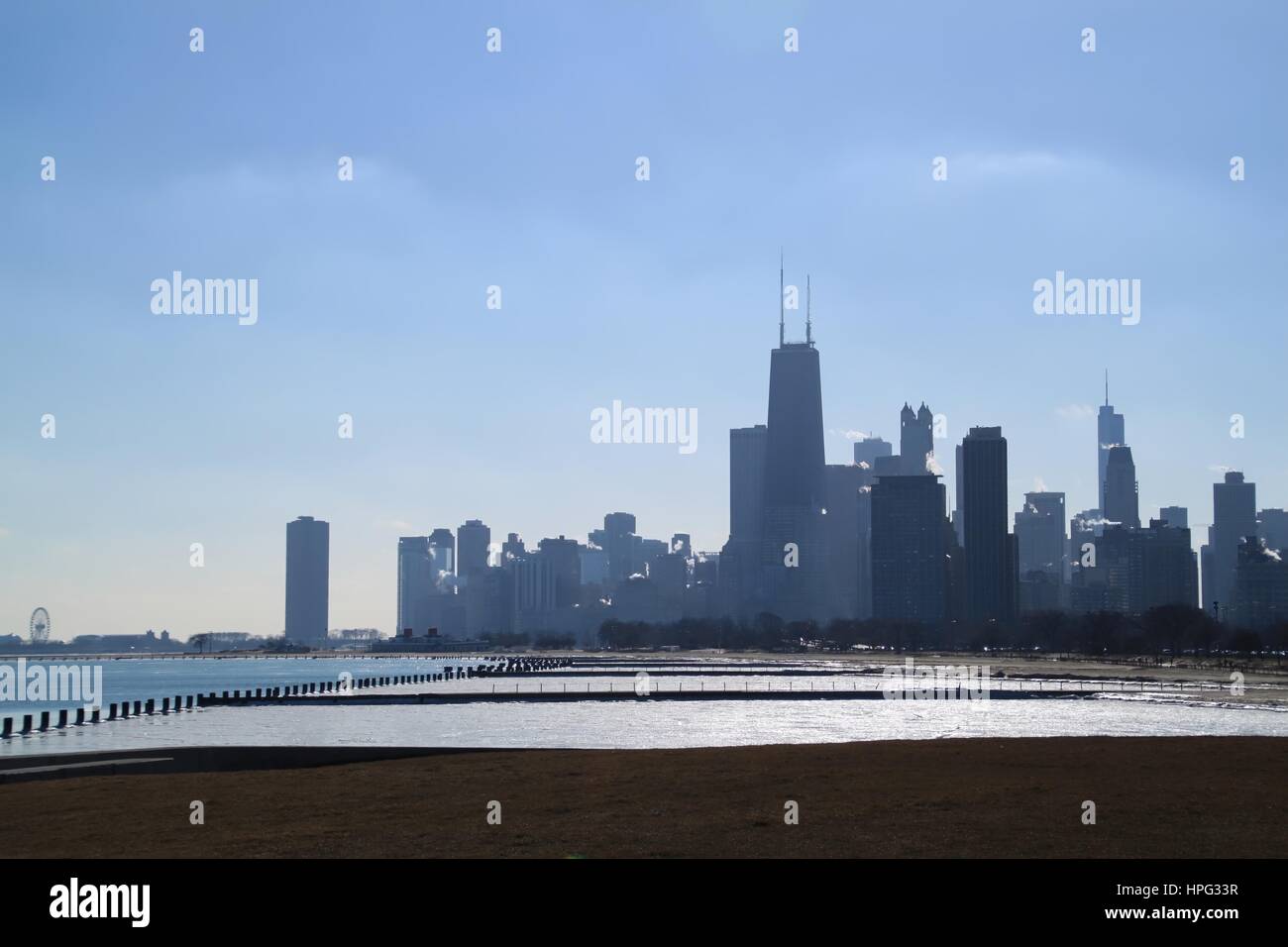 Wave breaking posts line up to lead to a cold, wintery view of the ...
