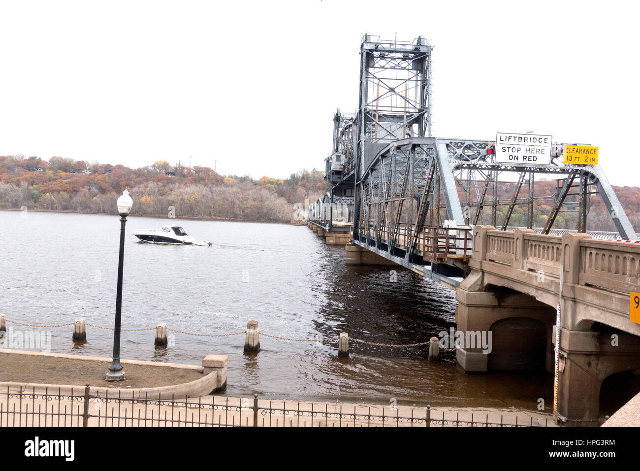 Minnesota - Boat passing under Stillwater vertical lift bridge on St ...