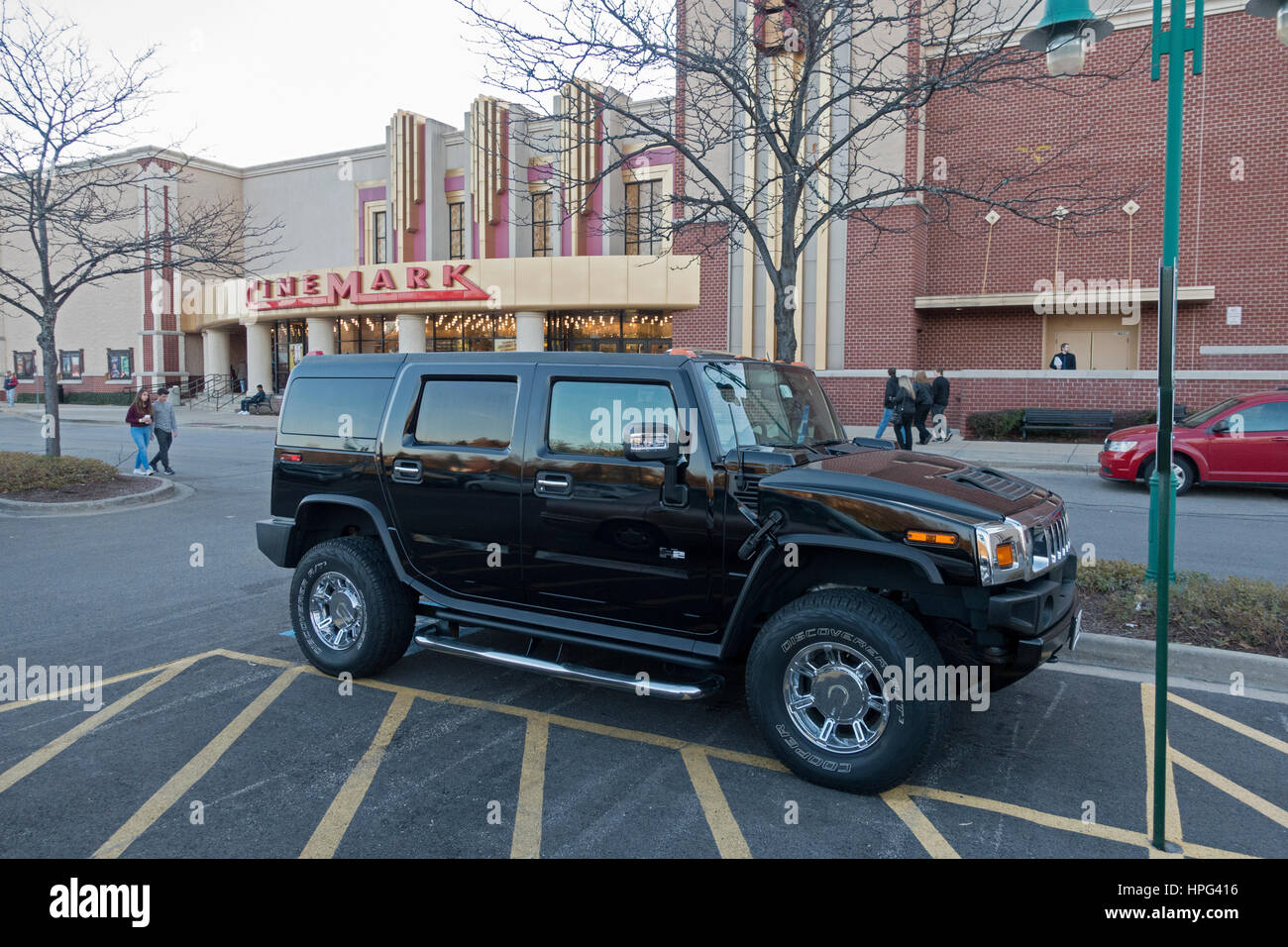 Black Hummer H2 SUV parked in the CineMark theater parking lot. Downers ...