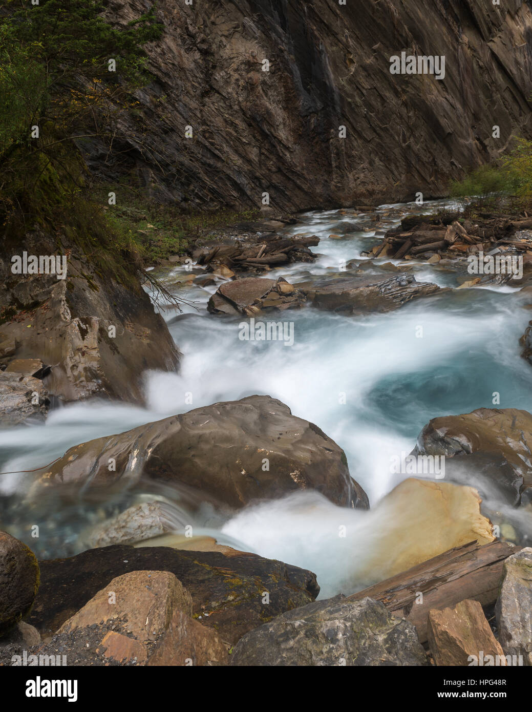 Rocks in mountain stream Stock Photo - Alamy