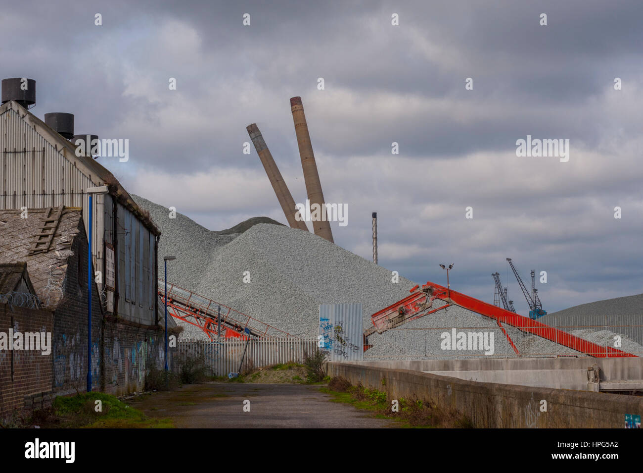 Demolition of the twin chimneys at the old Blue Circle cement works ...