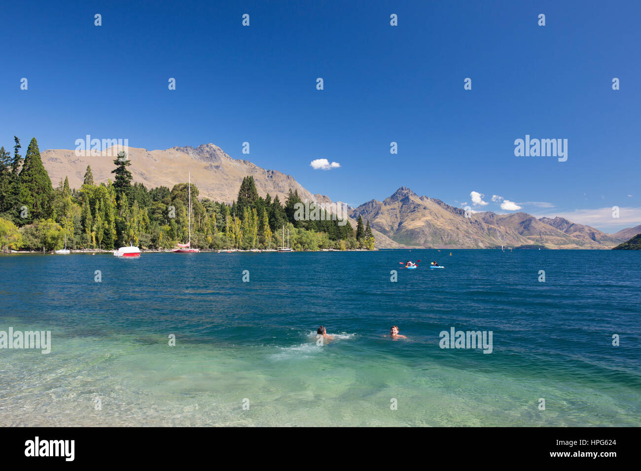 Two boys swimming hi-res stock photography and images - Alamy