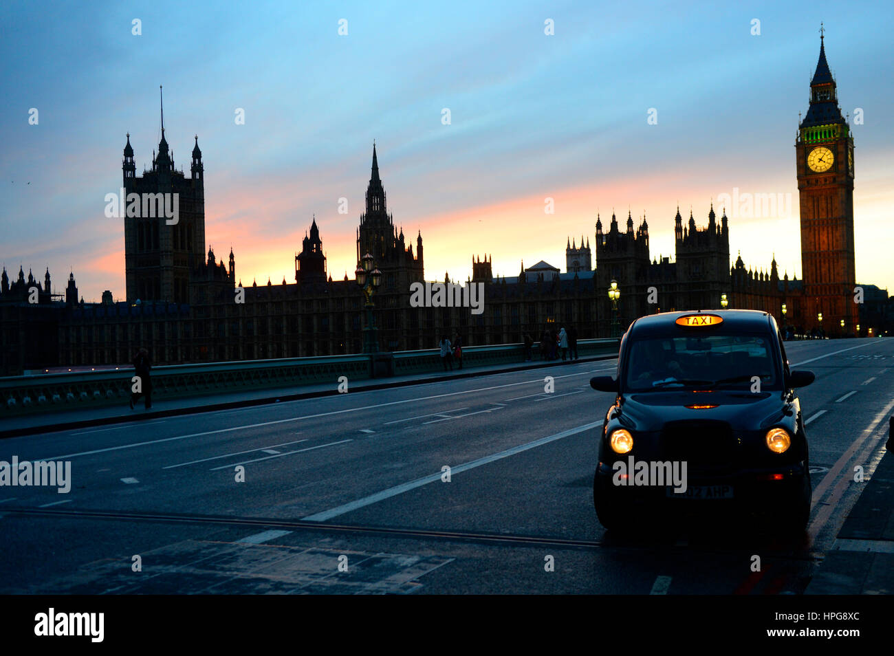 United Kingdom, London, a taxi in the foreground, Big Ben and the ...