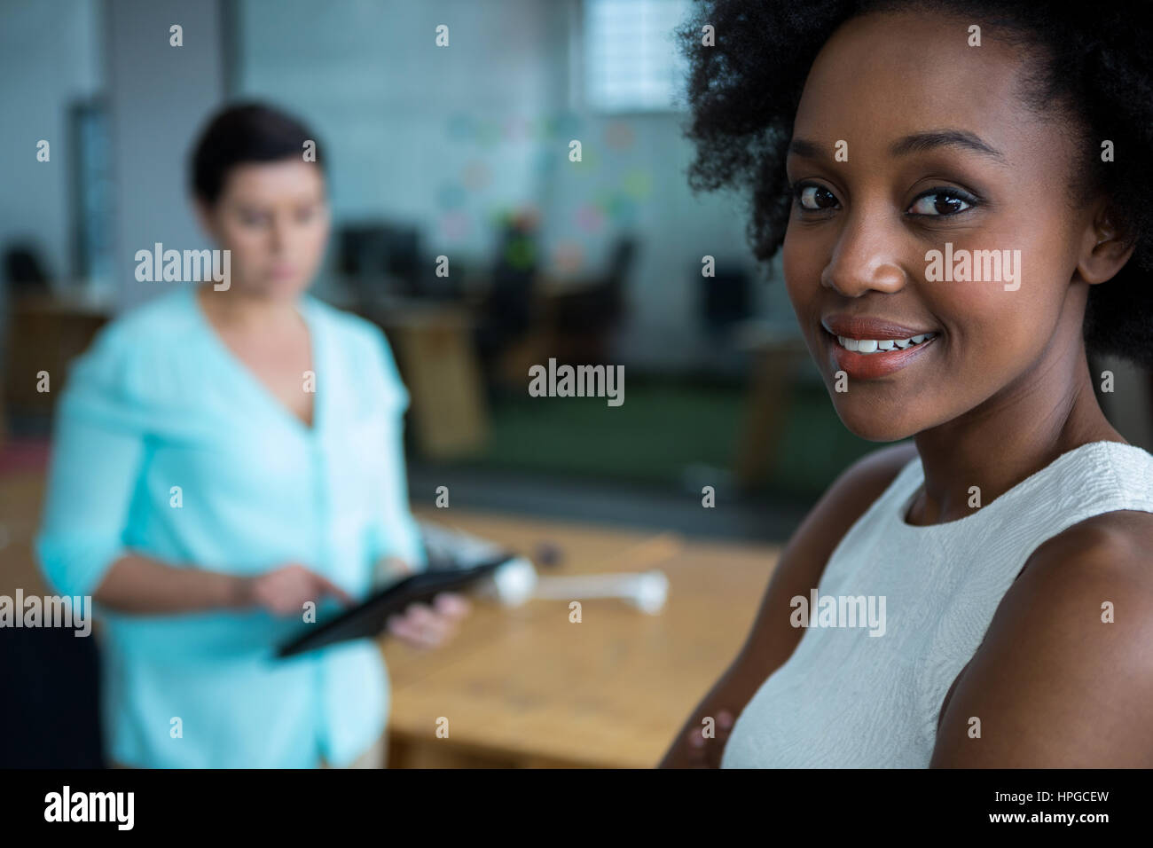 Portrait of beautiful female graphic designer smiling Stock Photo - Alamy