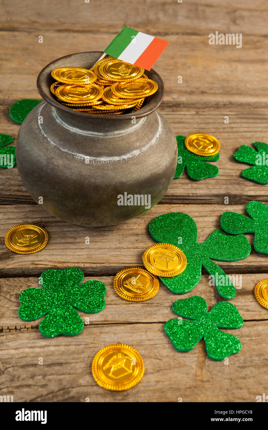 St. Patricks Day pot of chocolate gold coins with irish flag and ...