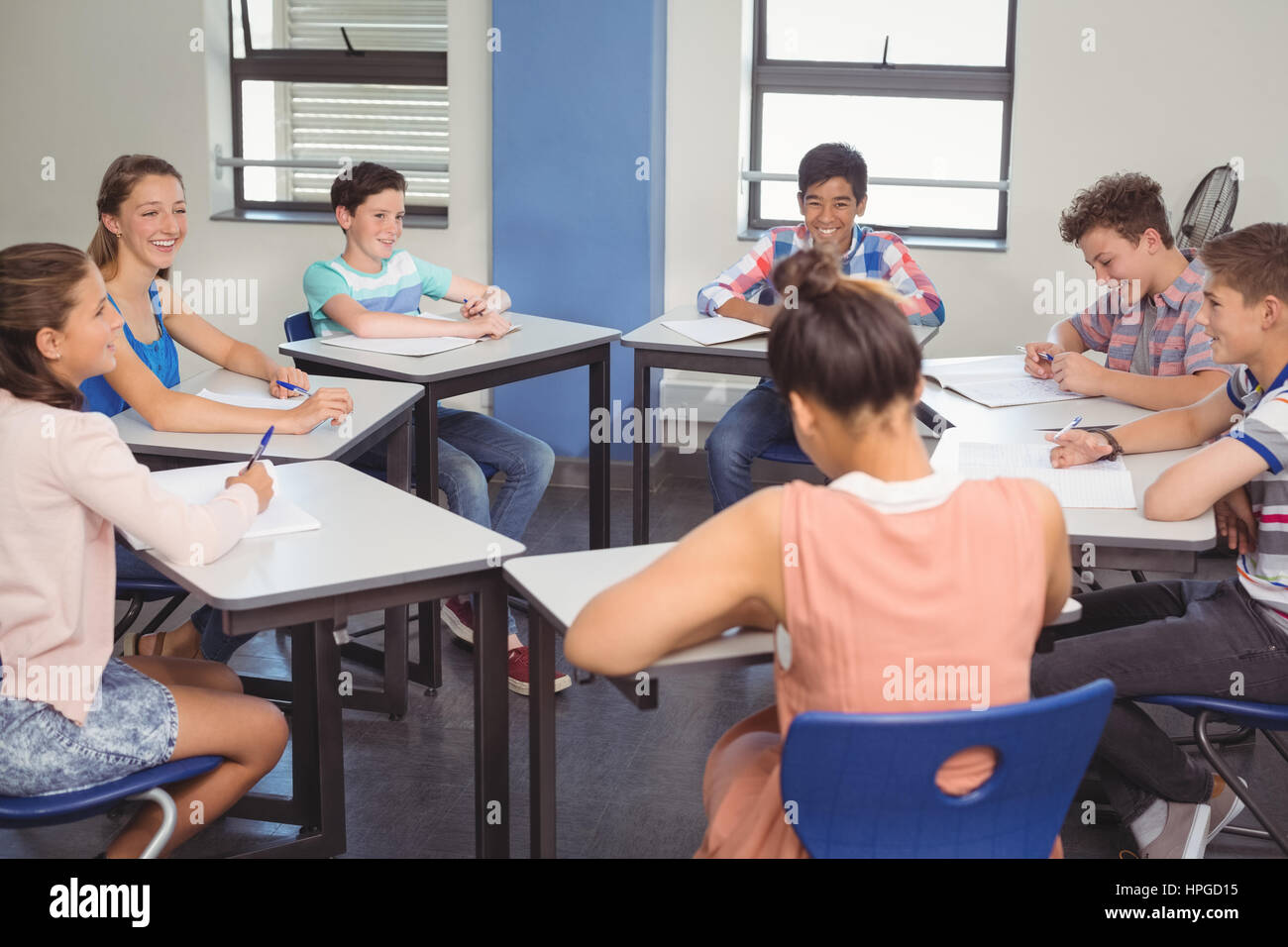 Students studying in classroom at school Stock Photo - Alamy