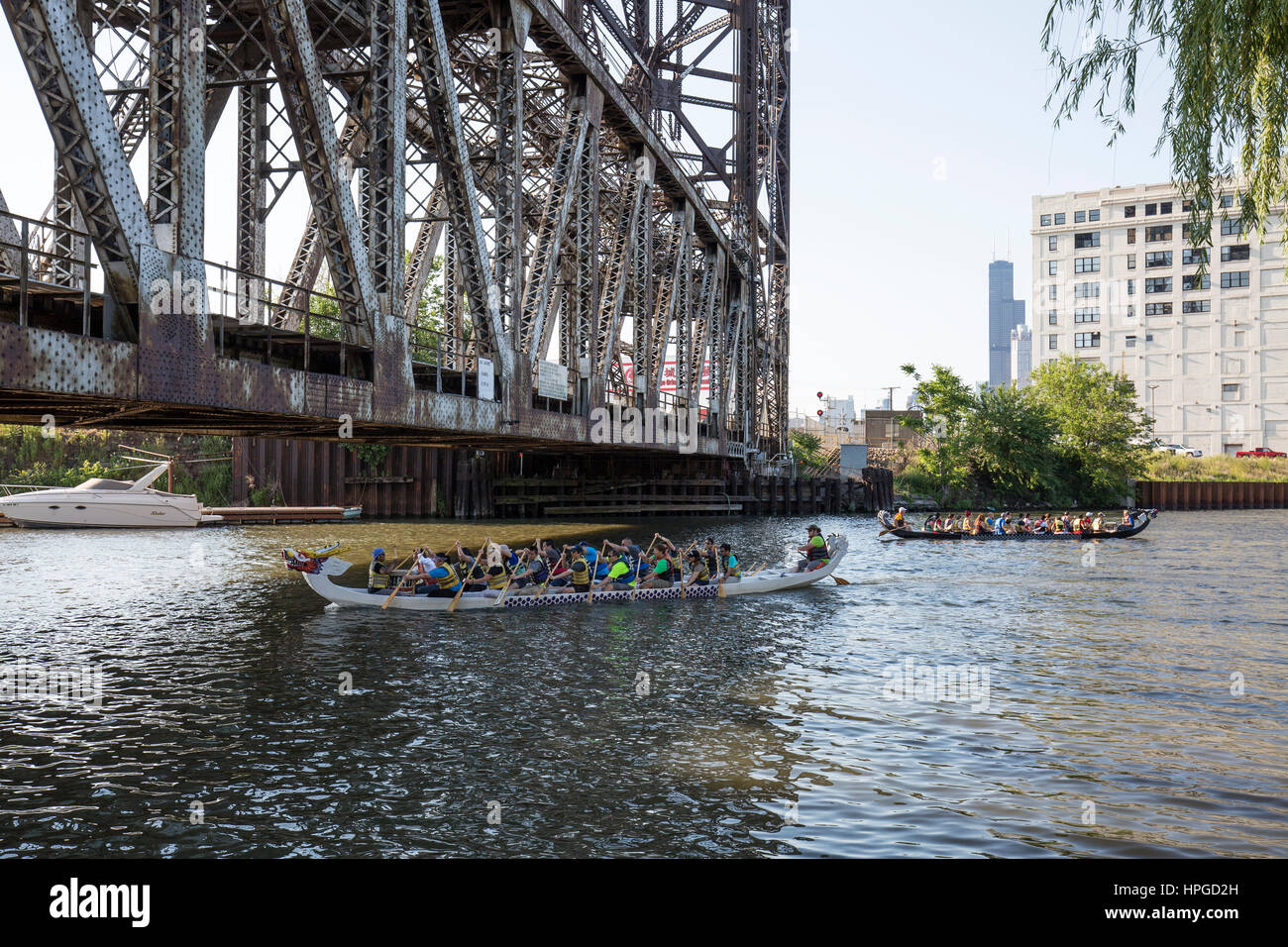 Lift Bridge over the Chicago River with two dragonboats on the water ...