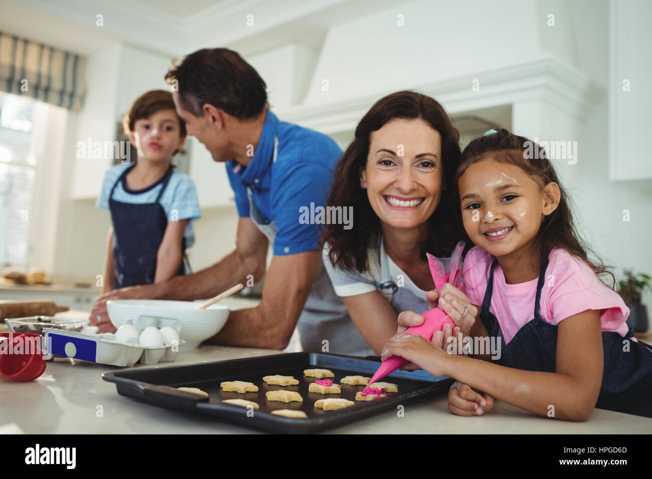 Boy mixing chocolate in kitchen hi-res stock photography and images - Alamy