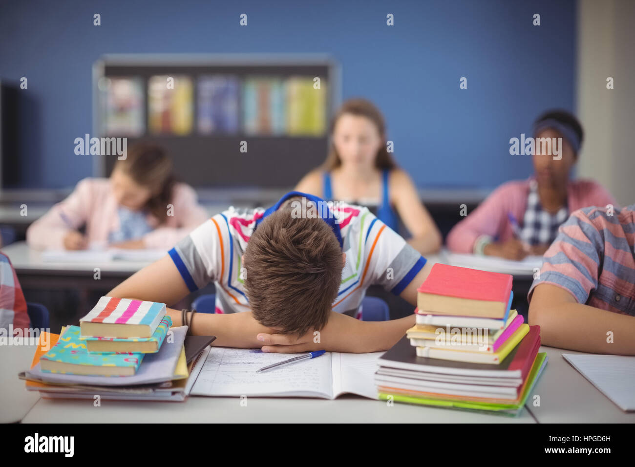 School girl sleeping in classroom hi-res stock photography and images ...