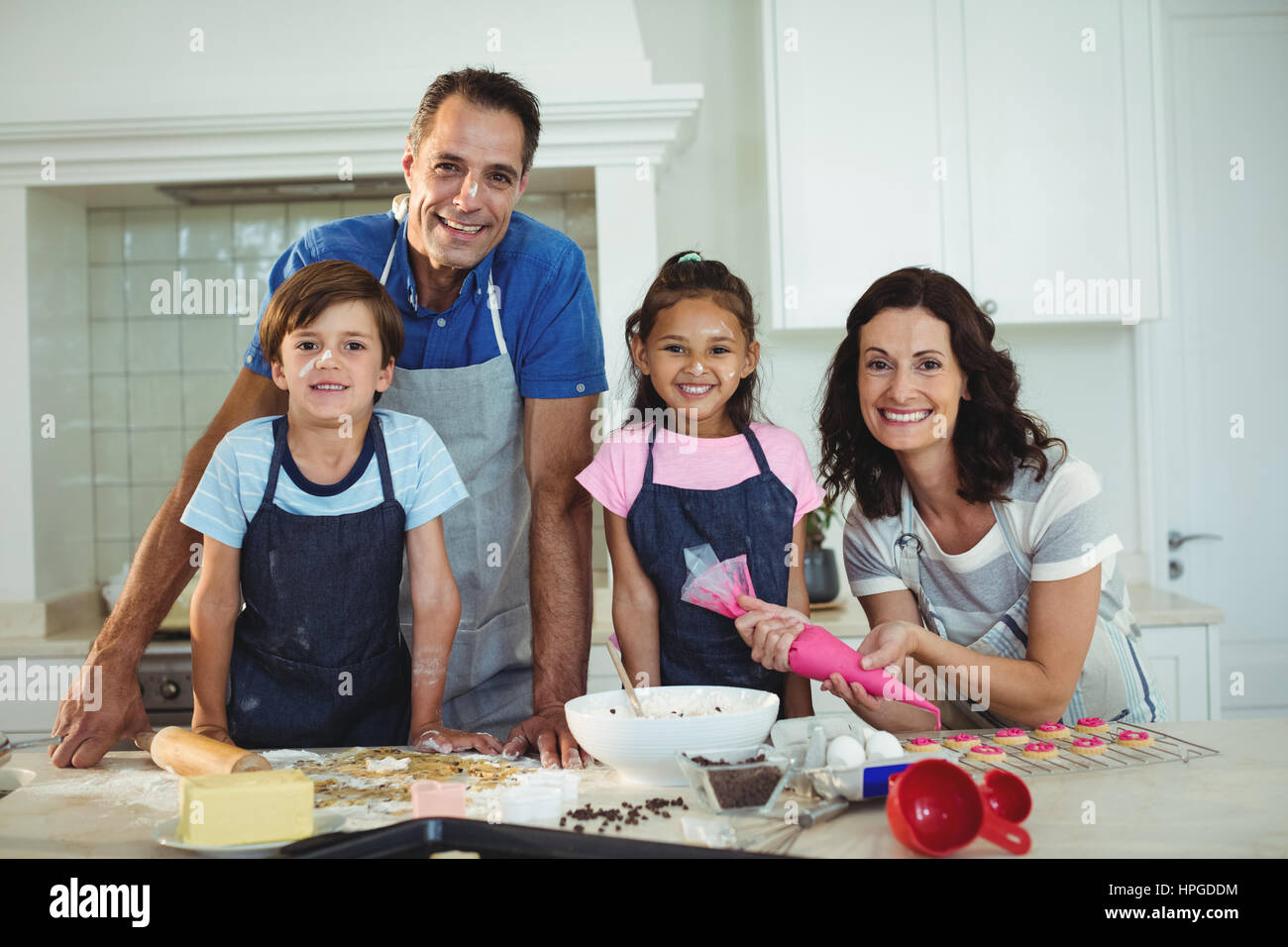 Boy mixing chocolate in kitchen hi-res stock photography and images - Alamy